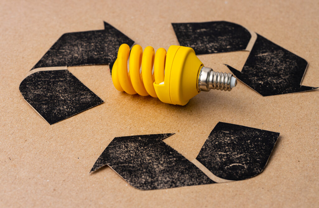 LED light bulb with recycle symbol on craft paper - il Giornale di ...